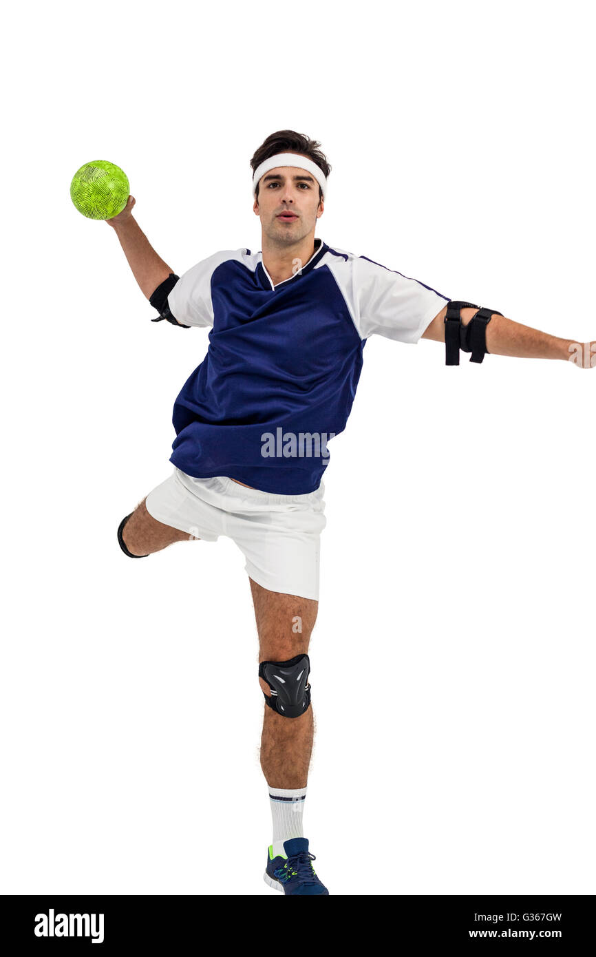 Portrait of sportsman throwing a ball Stock Photo - Alamy