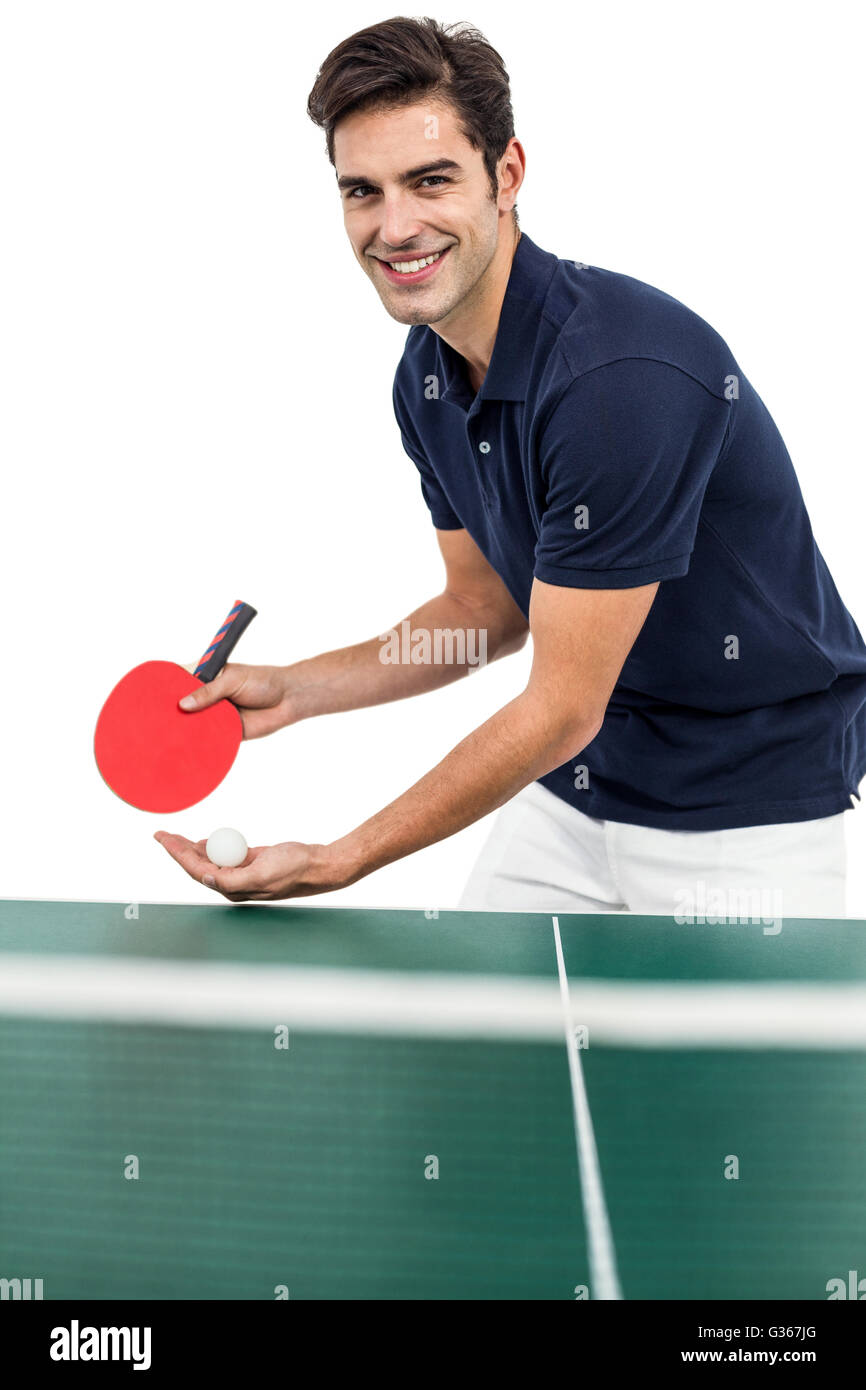Portrait of male athlete playing table tennis Stock Photo - Alamy