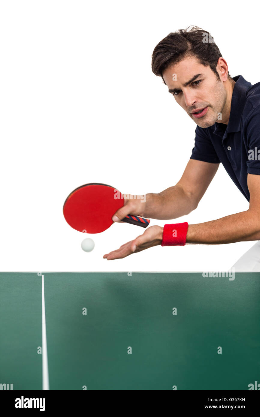 Confident male athlete playing table tennis Stock Photo - Alamy