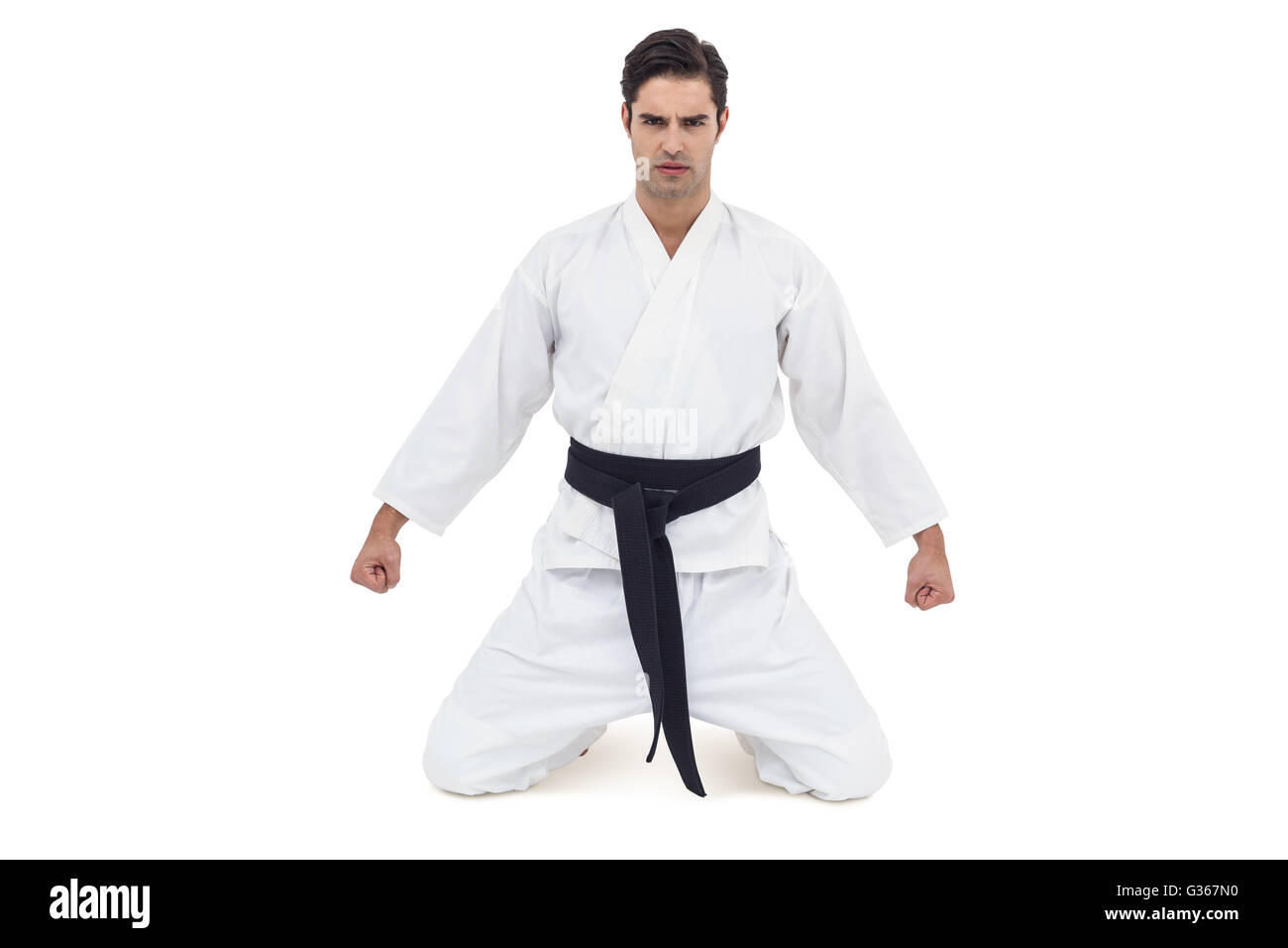 Karate kneeling Cut Out Stock Images & Pictures - Alamy