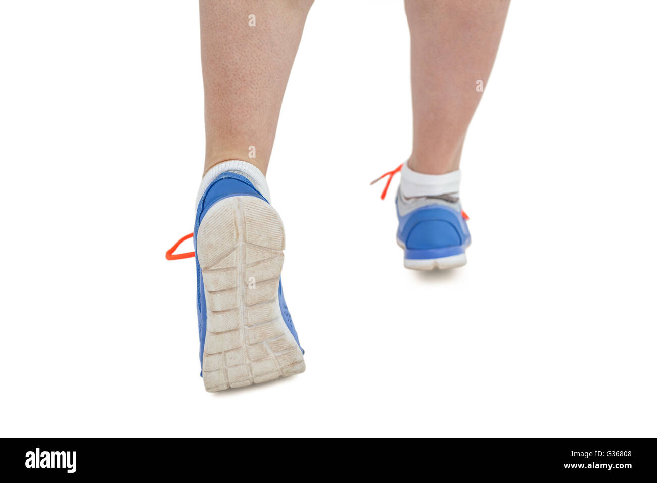 Athlete woman in ready to run position Stock Photo - Alamy