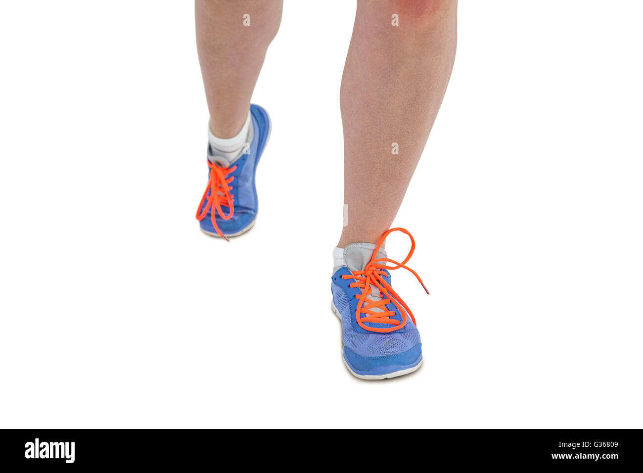 Athlete woman in ready to run position Stock Photo - Alamy