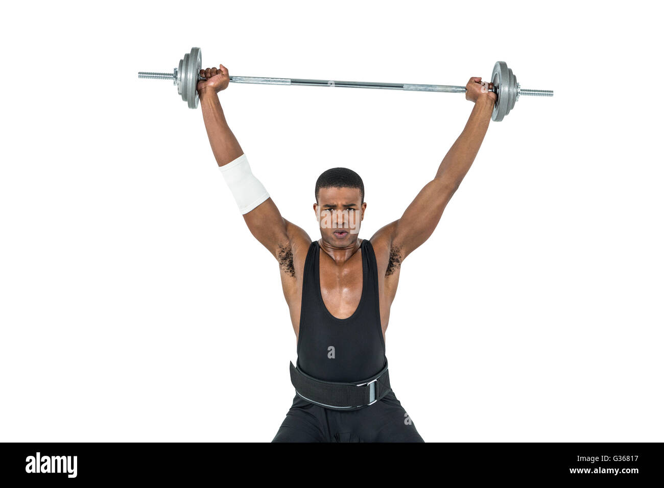 Portrait of bodybuilder lifting heavy barbell weights Stock Photo - Alamy