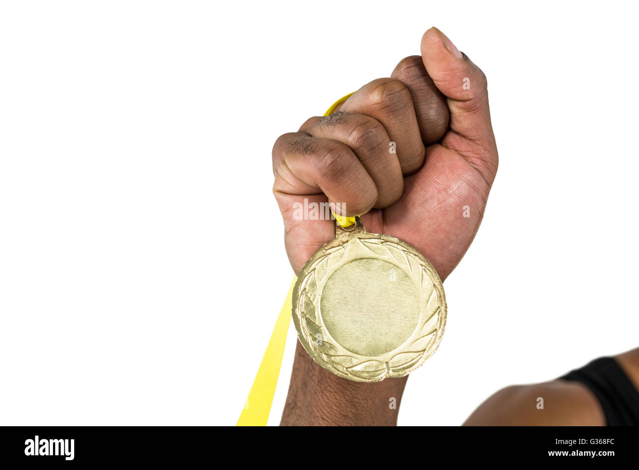 Athlete holding gold medal after victory Stock Photo - Alamy