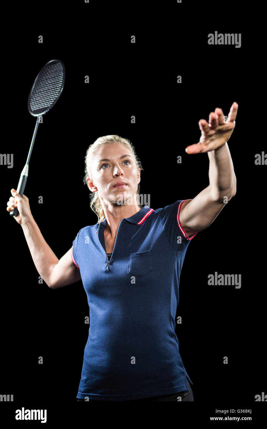 Badminton player playing badminton Stock Photo - Alamy
