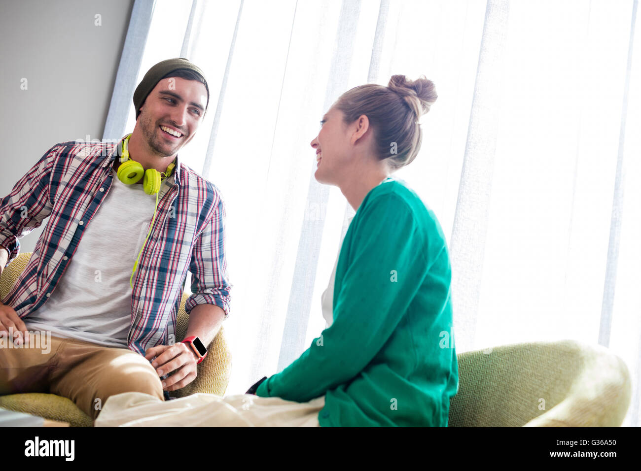 Talking smiling hi-res stock photography and images - Alamy