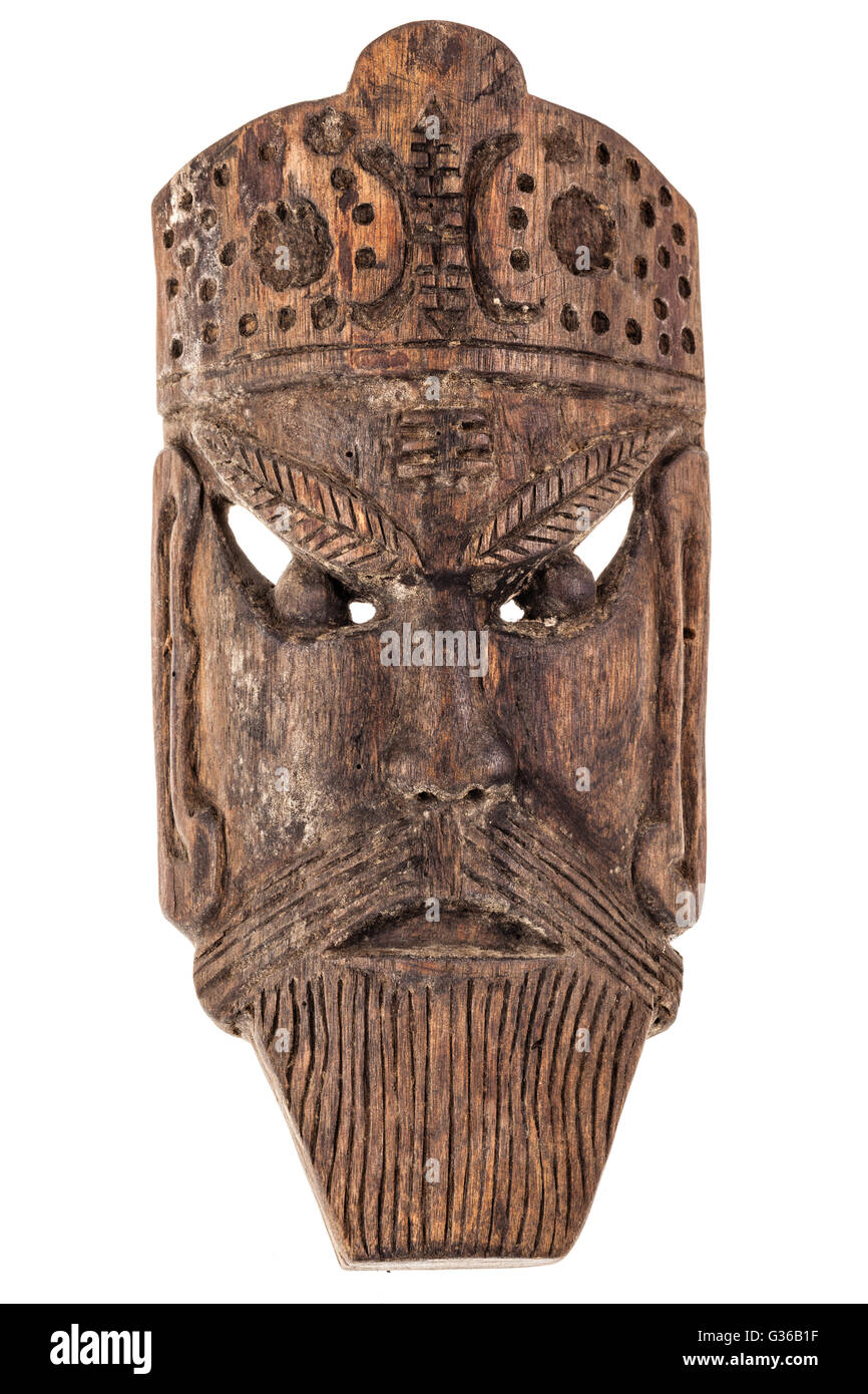 an ancient european wooden mask depicting a king isolated over a white ...