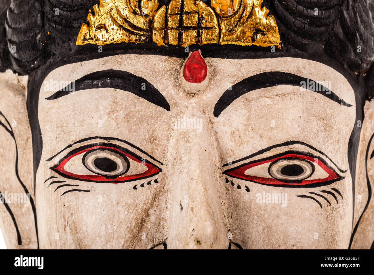 close up shot of an old traditional indonesian painted mask Stock Photo ...