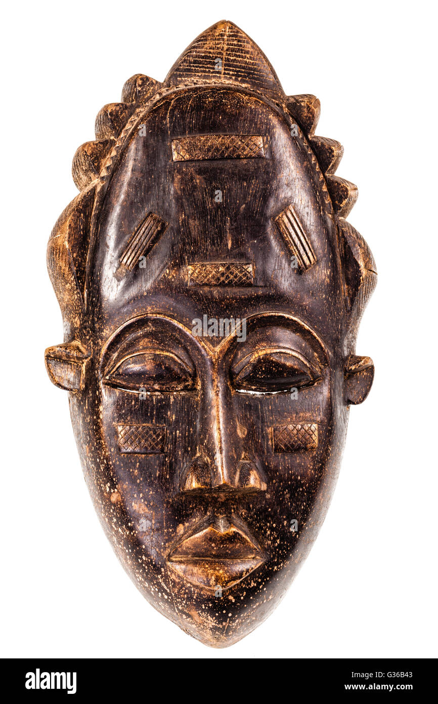an ancient african wooden mask isolated over a white background Stock ...