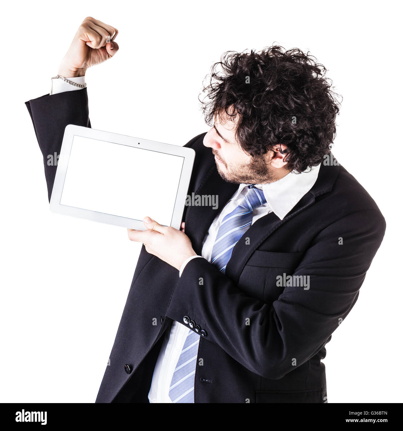 a young and handsome businessman holding a tablet isolated over a white ...