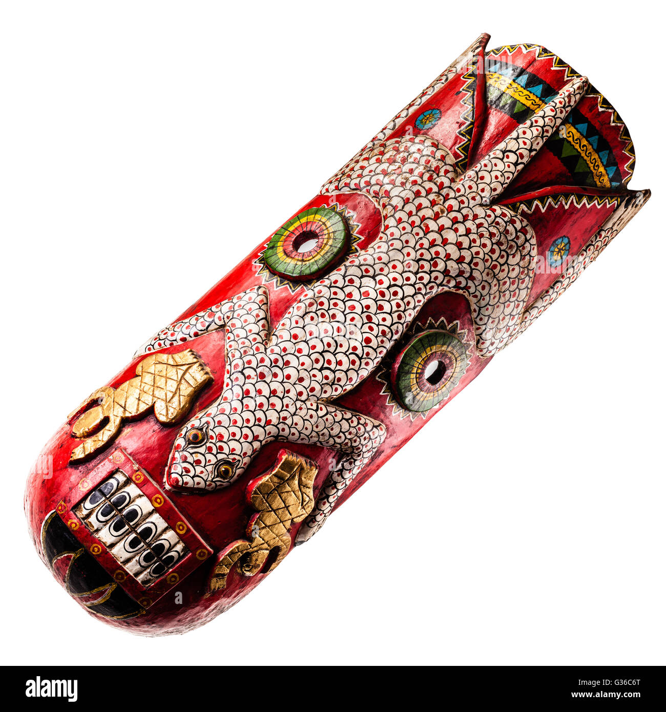 an ancient big witchdoctor tribal mask isolated over a white background ...