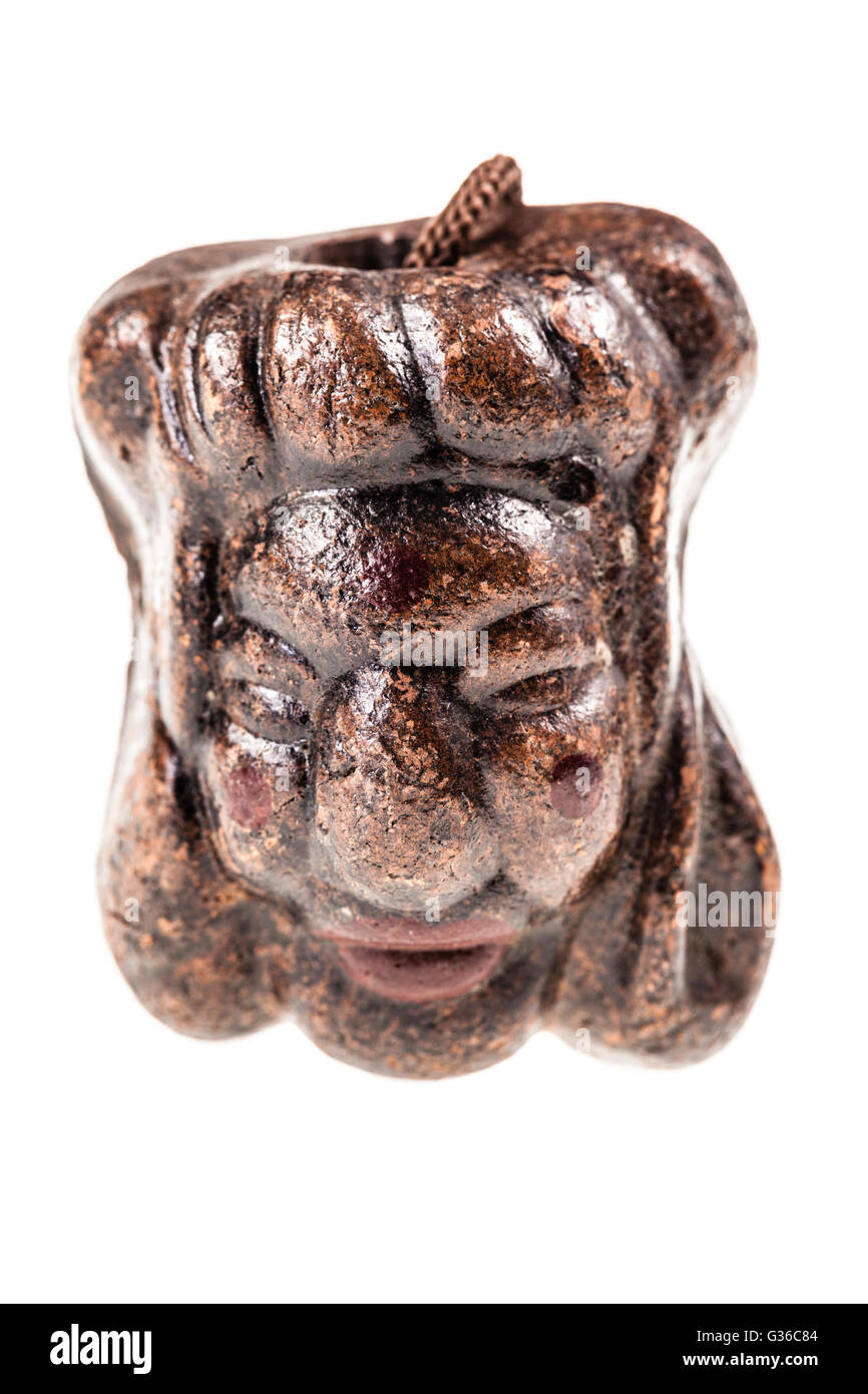 an ancient japanese wooden mask isolated over a white background Stock ...