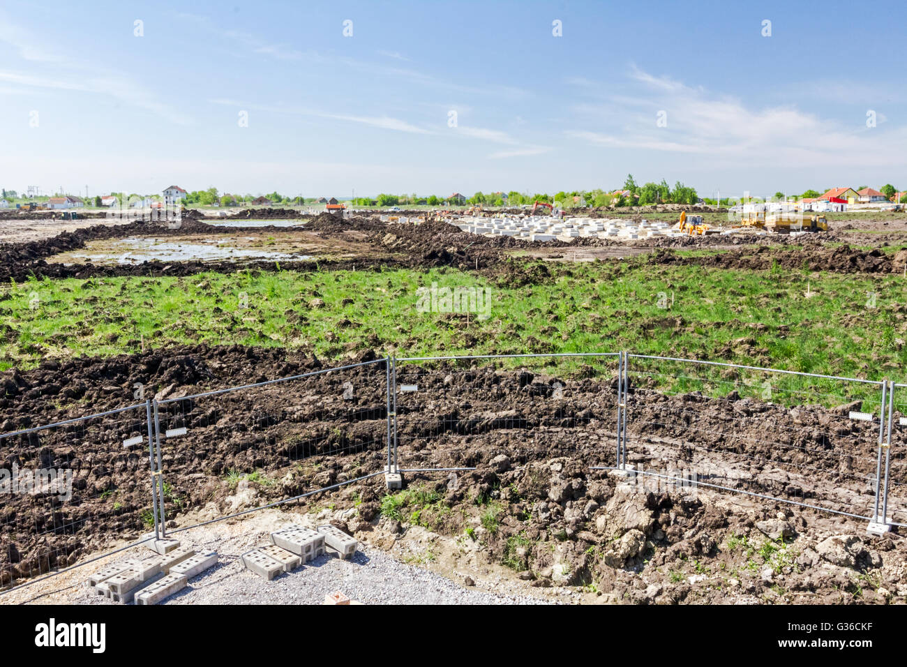 Landscape transform into urban area with machinery, people are working ...