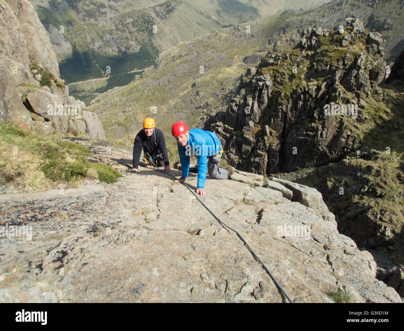 Mountaineers climbing Pillar Rock via the Slab and Notch route, Lake ...