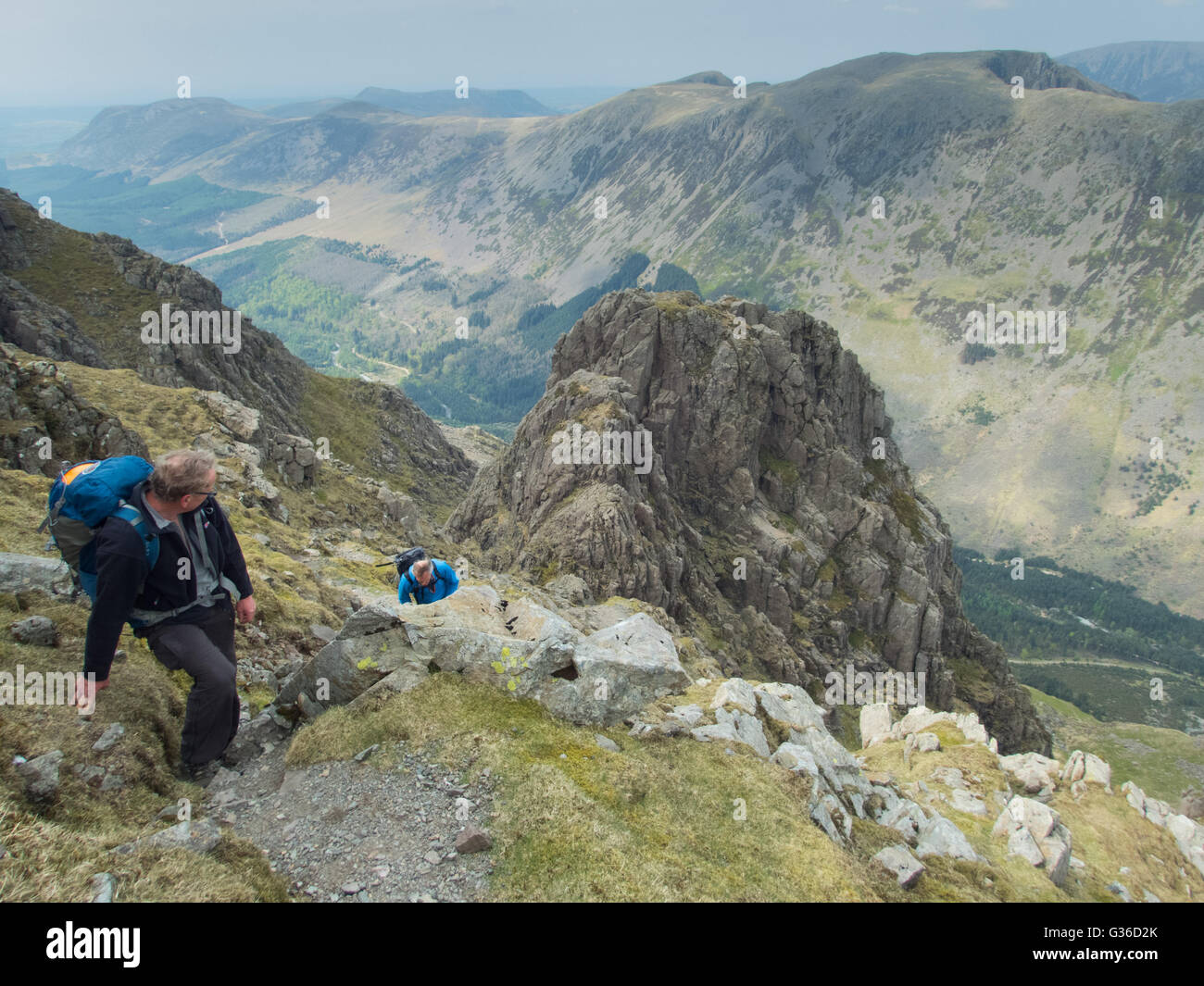 Mountaineers climbing Pillar Mountain after ascending Pillar Rock via ...
