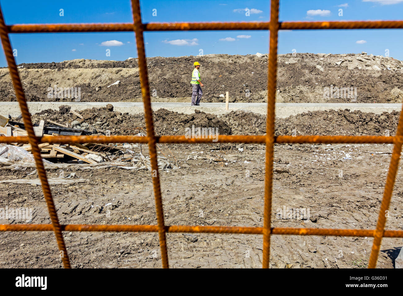 Rusty concrete reinforcement, steel bars, construction site is in ...
