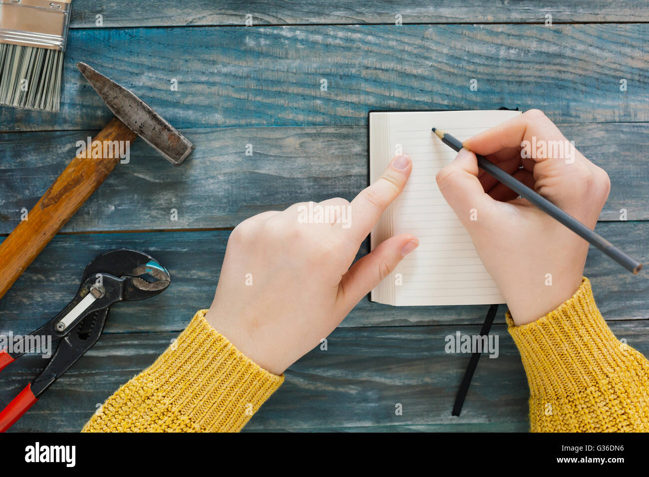 Carpenter's table Hand writing on paper on carpenter's table Stock ...
