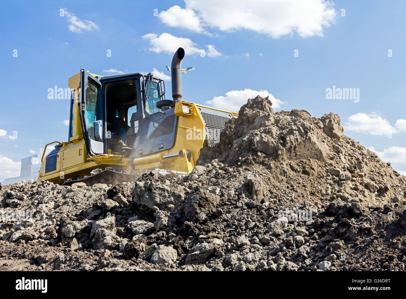 Detail on caterpillar while he moving ground Stock Photo - Alamy