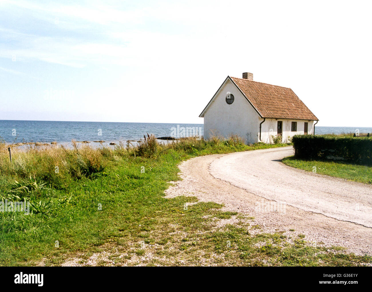 Lonely house on the coast Stock Photo - Alamy