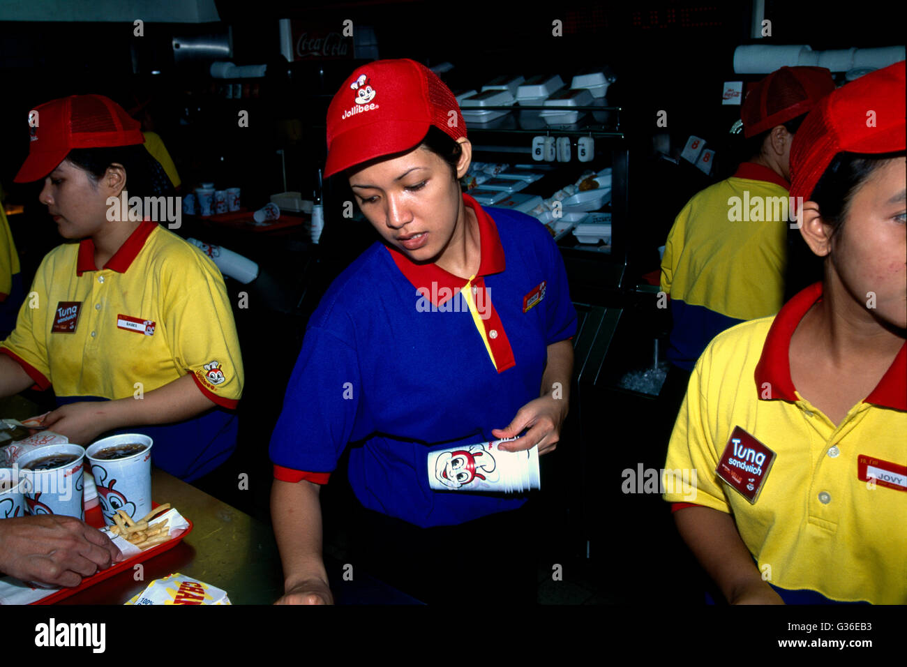 Fast Food Workers in restaurant, Manila, Philippines Stock Photo - Alamy