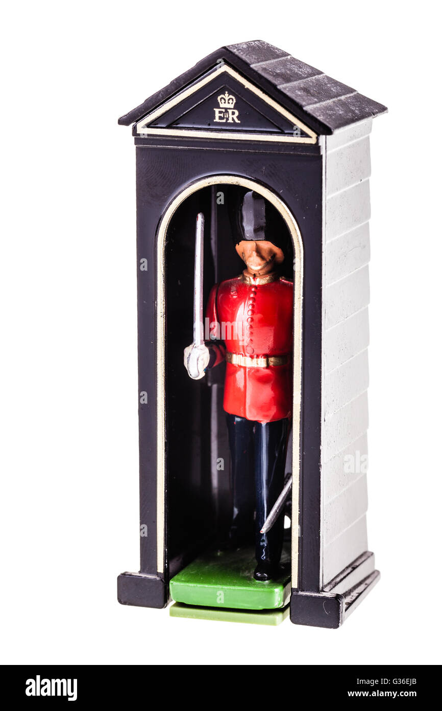 a tin british guard in a watch box isolated over a white background ...