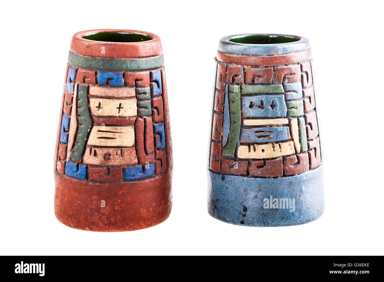 two mexican inca vase isolated over a white background Stock Photo - Alamy
