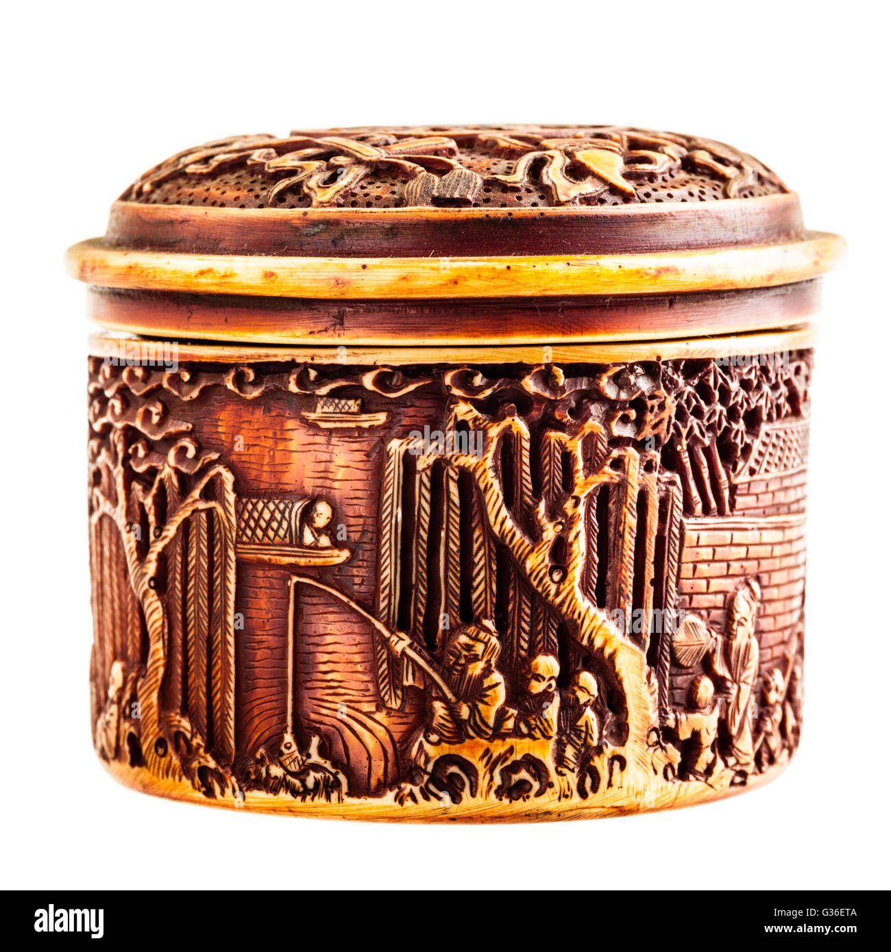 an ancient chinese ornated container isolated over a white background ...