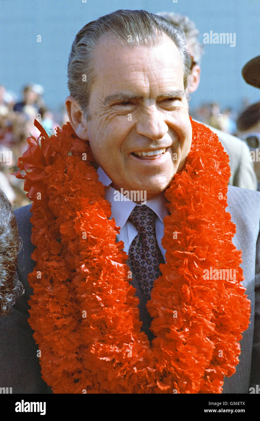 U.S President Richard Nixon wearing a flower lei during a welcoming ...