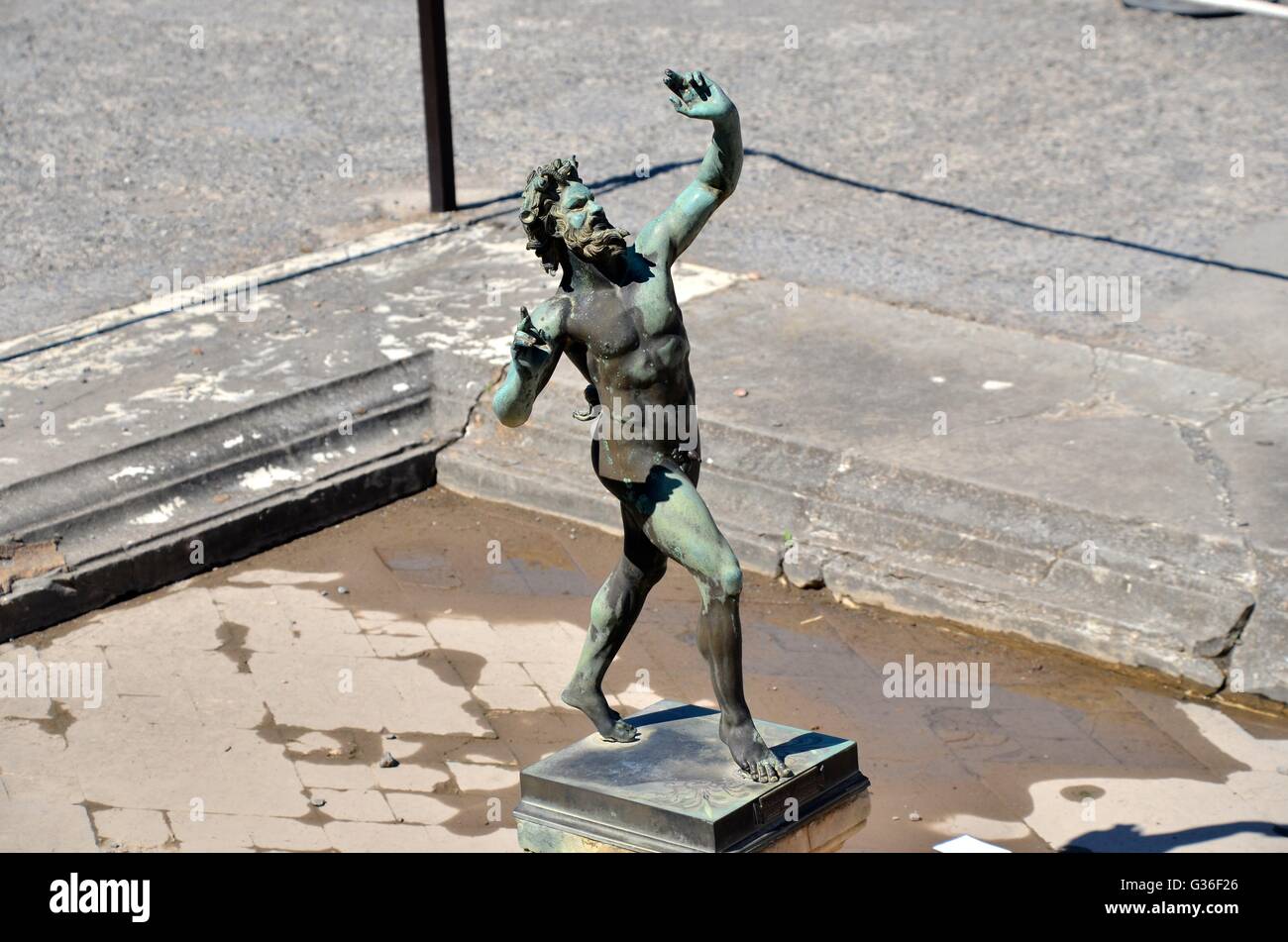 Dancing Faun replica at House of the faun, Pompeii Italy Stock Photo ...