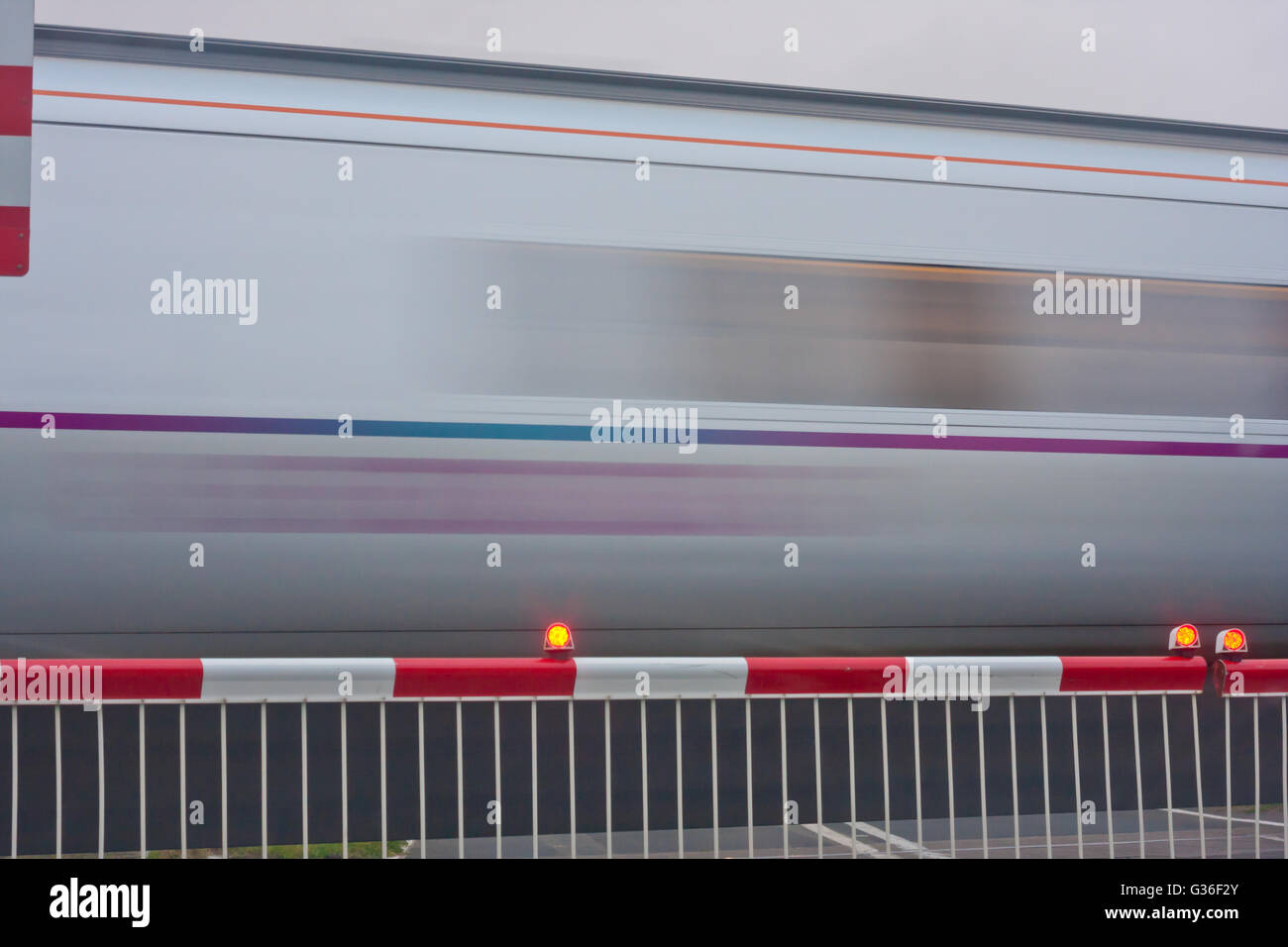 Train passing gate hi-res stock photography and images - Alamy