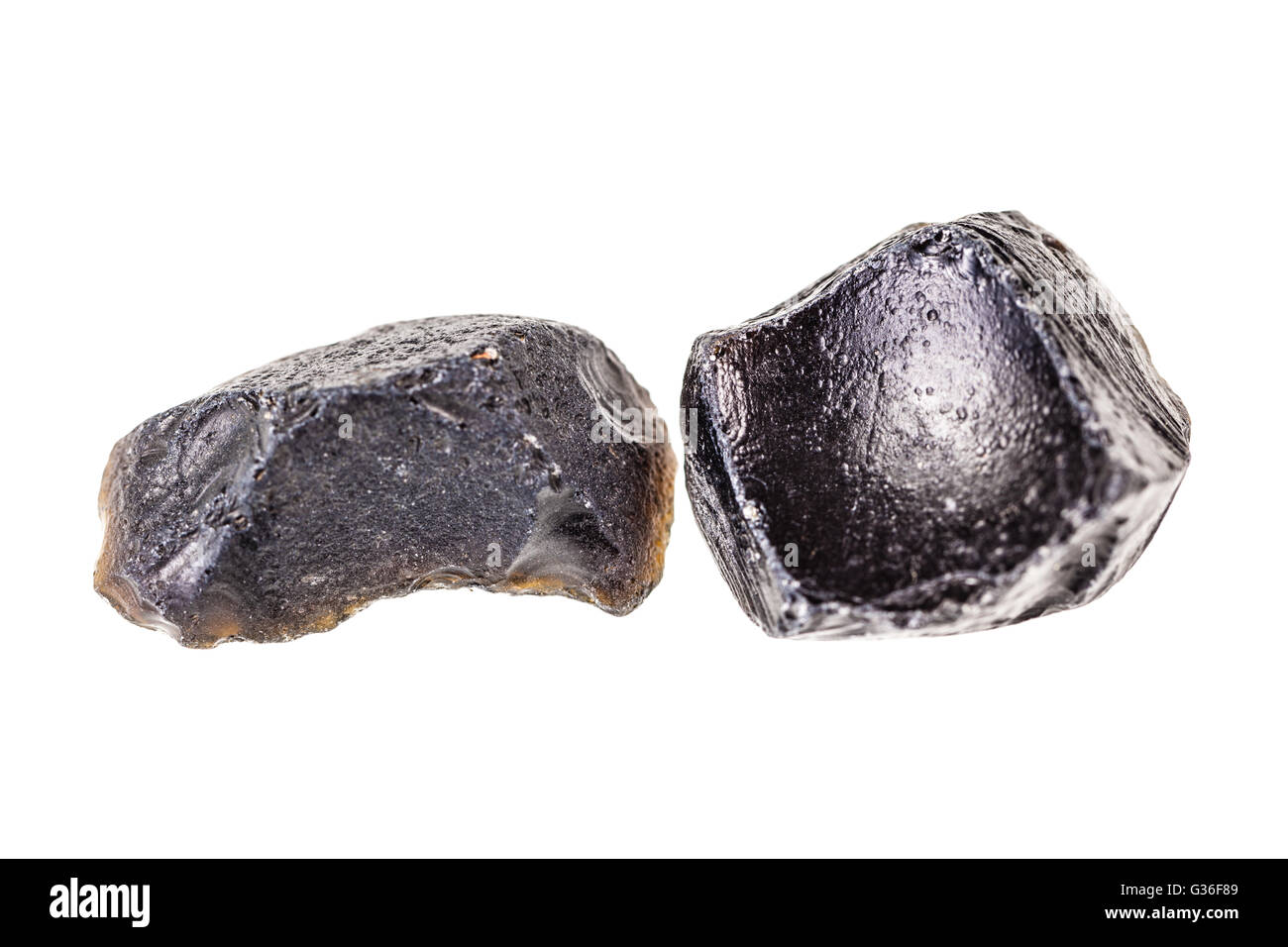 two small obsidian stones isolated over a white background Stock Photo ...