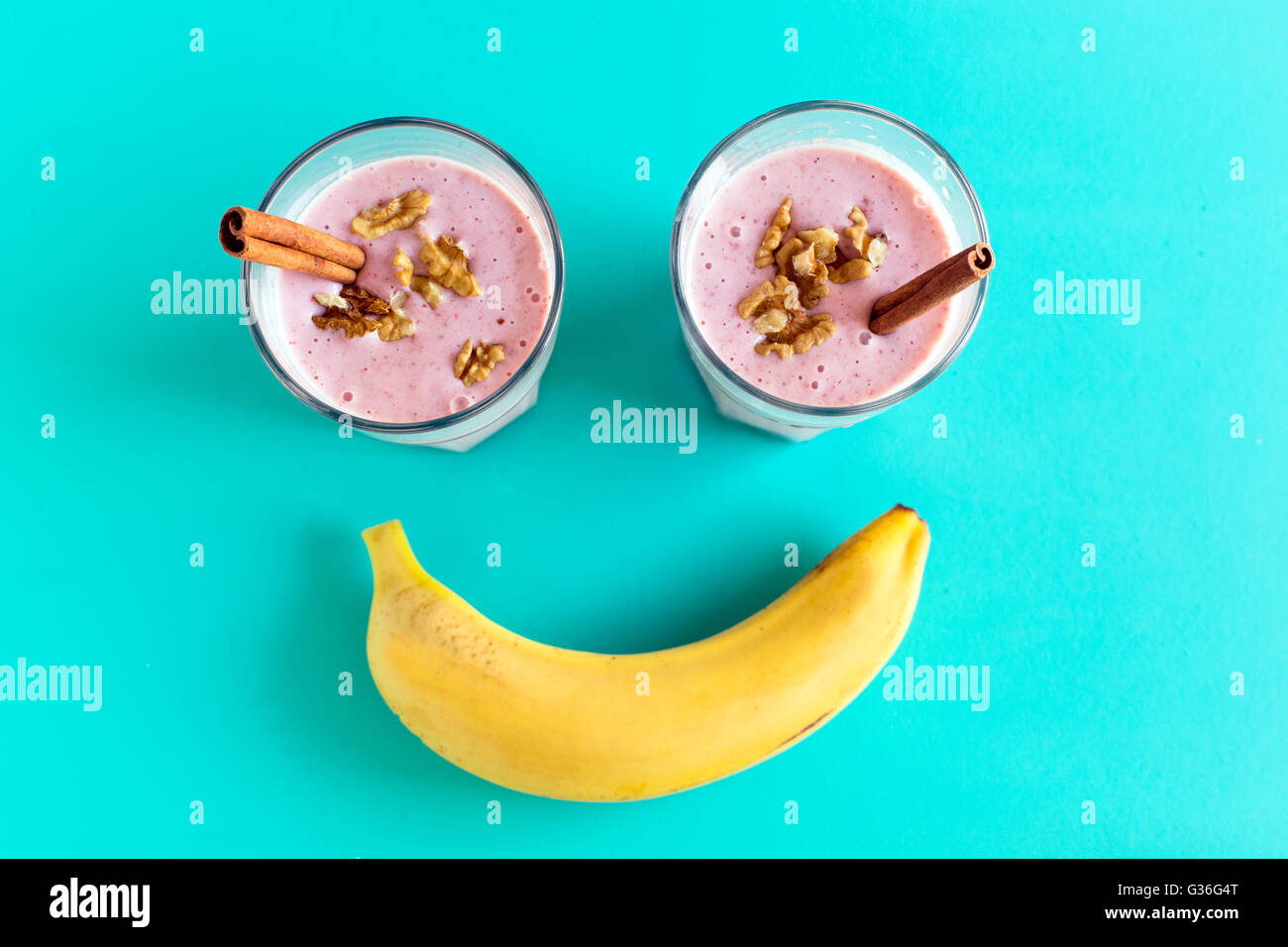 Fresh milk, strawberry drink in shape of smile Stock Photo - Alamy