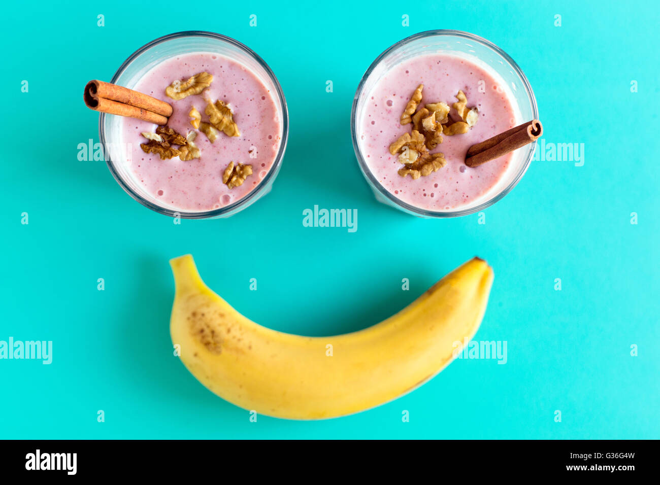 Fresh milk, strawberry drink in shape of smile Stock Photo - Alamy
