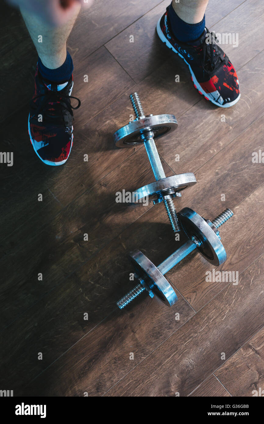 Top view of a dumbells on a wooden background in a gym, healthz ...