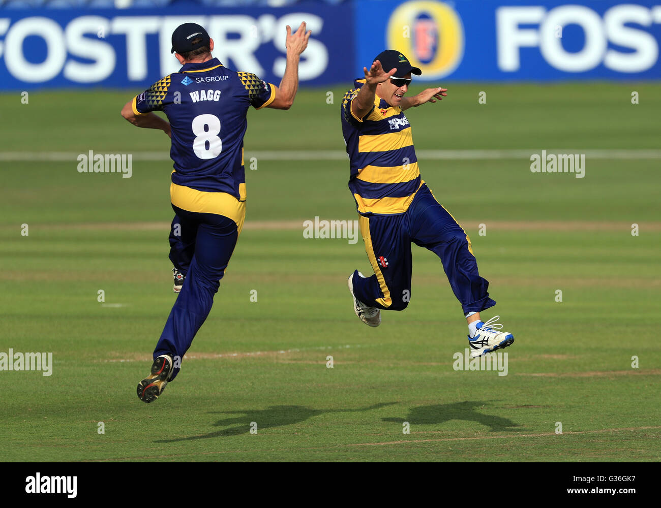 Glamorgans dean cosker celebrates running out sussexs chris nash hi-res ...