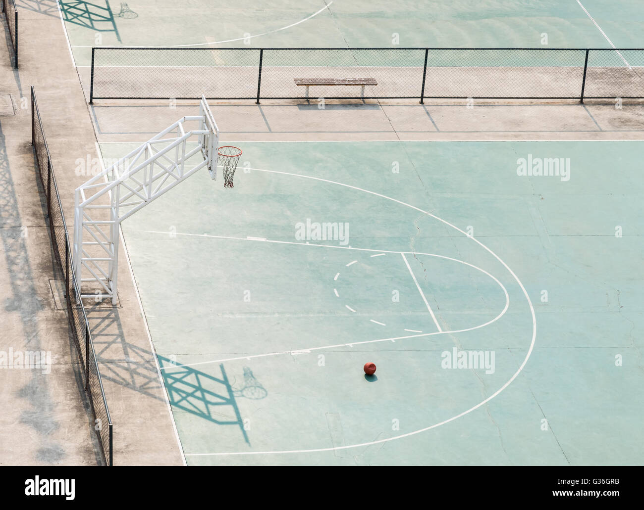 Outdoor basketball field with the ball in the urban park Stock Photo ...