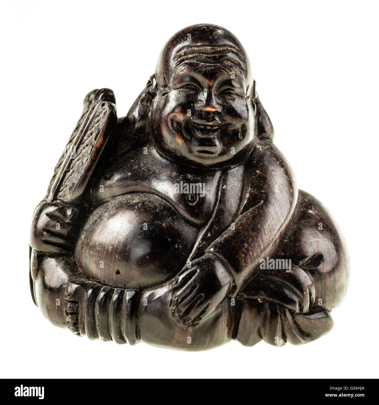 a smiling fat wooden buddha statuette isolated over a white background ...
