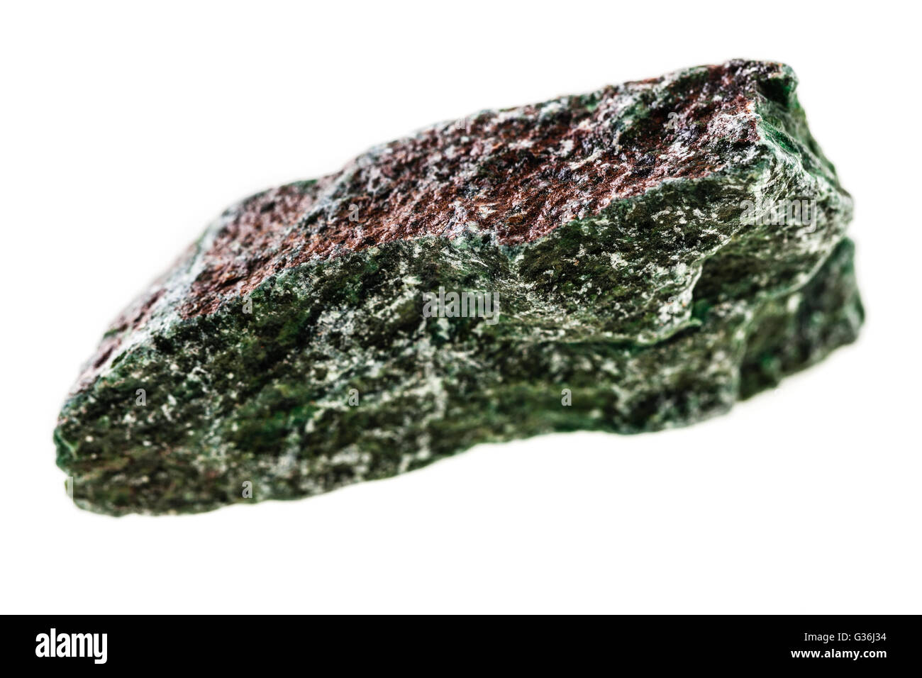 close up shot of a fragment of fuchsite mineral isolated on a white ...