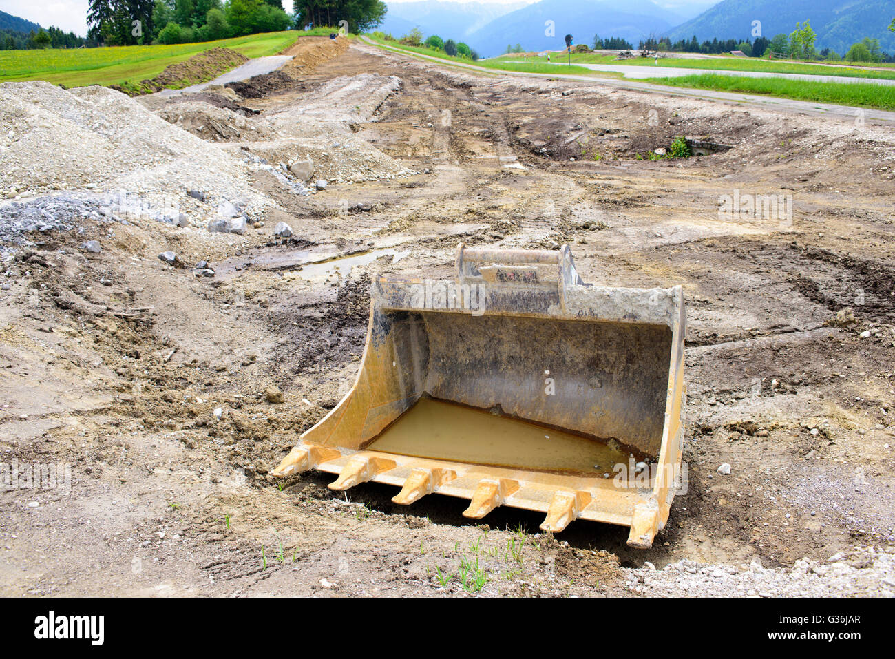 construction site with digger at new road Stock Photo - Alamy