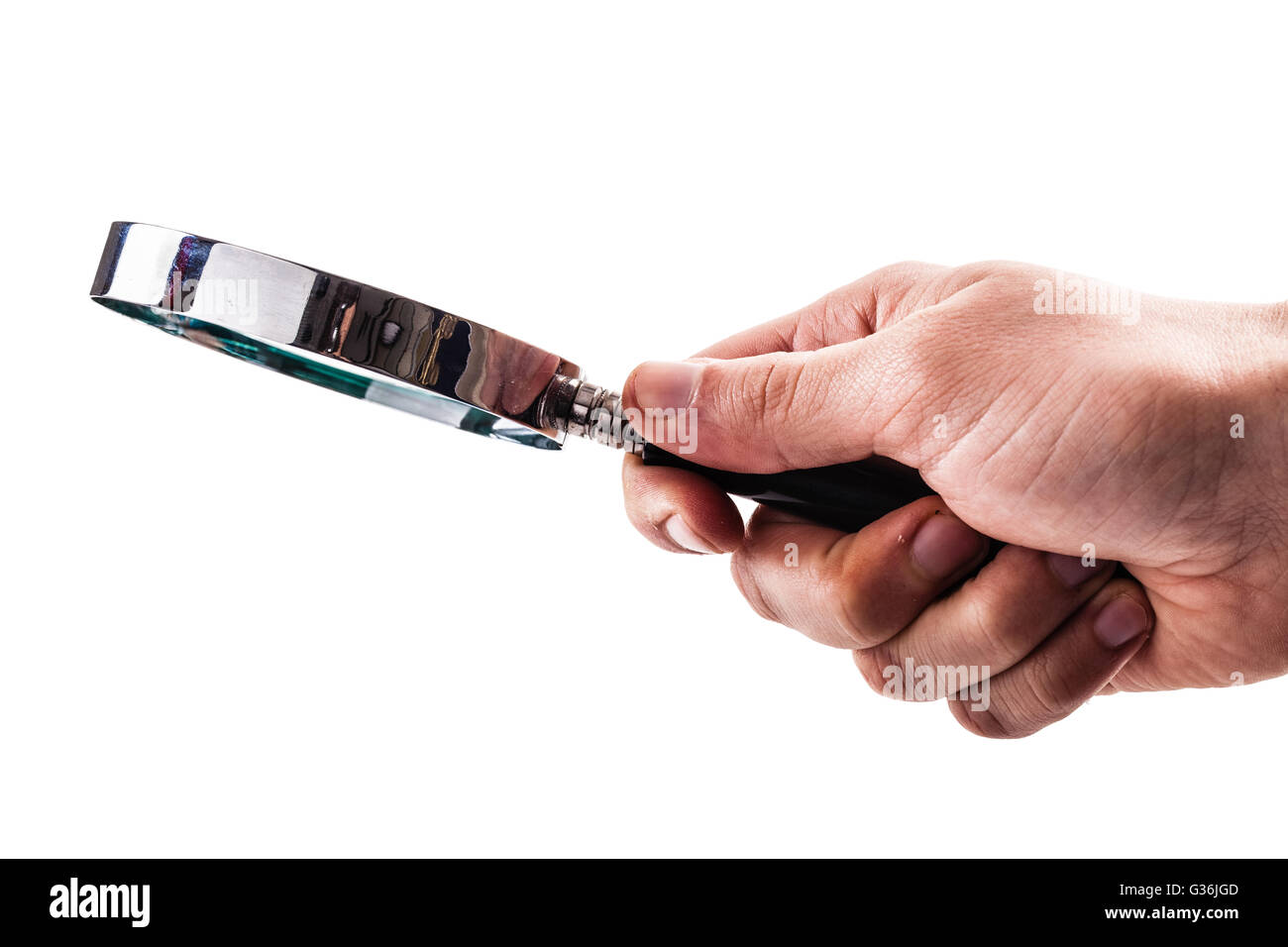 a male hand holding a magnifiyng glass isolated over a white background ...