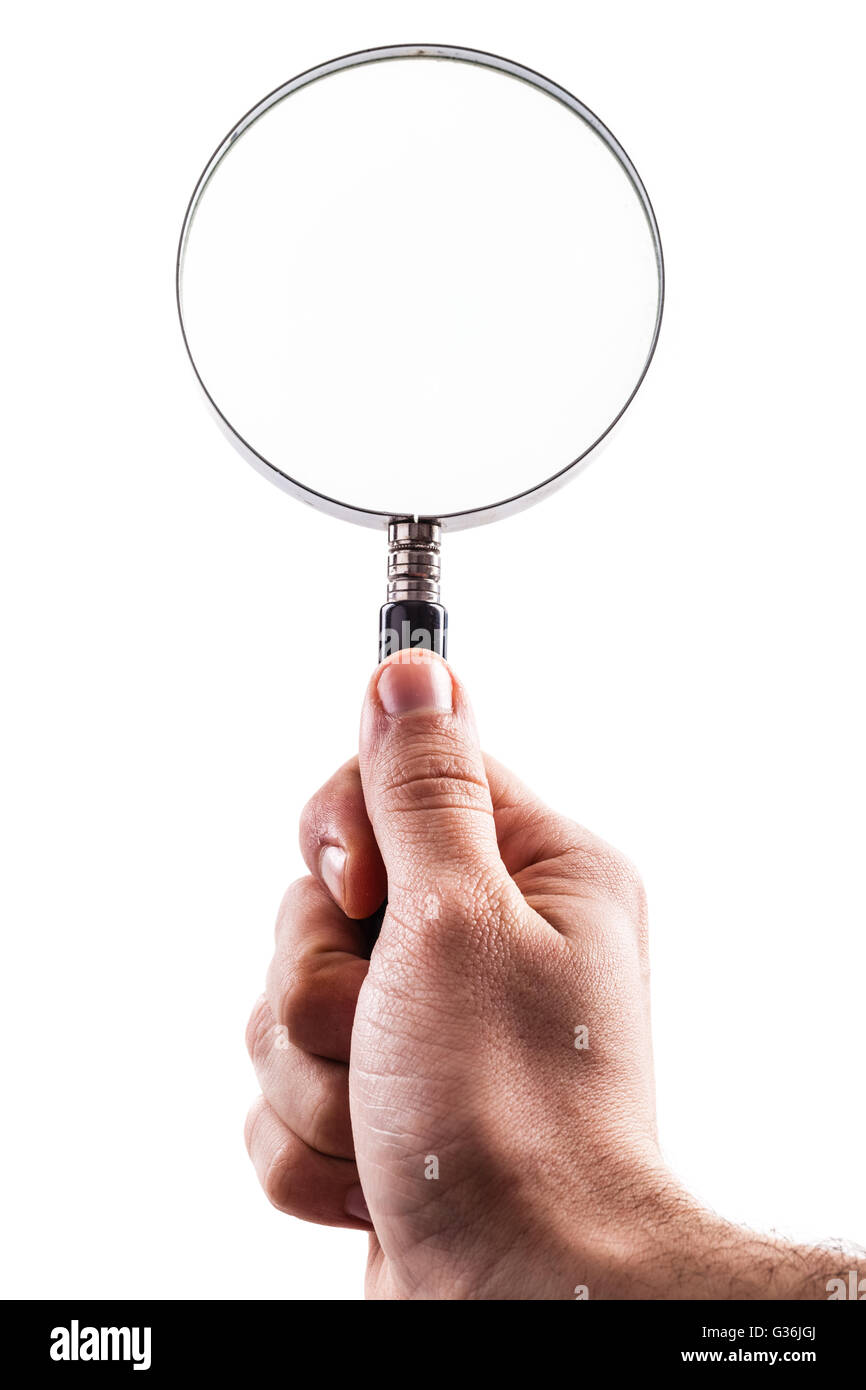 a male hand holding a magnifiyng glass isolated over a white background ...