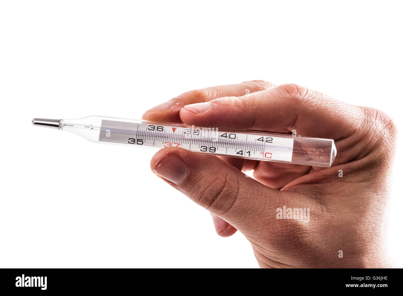 a male hand holding a thermometer isolated over a white background ...