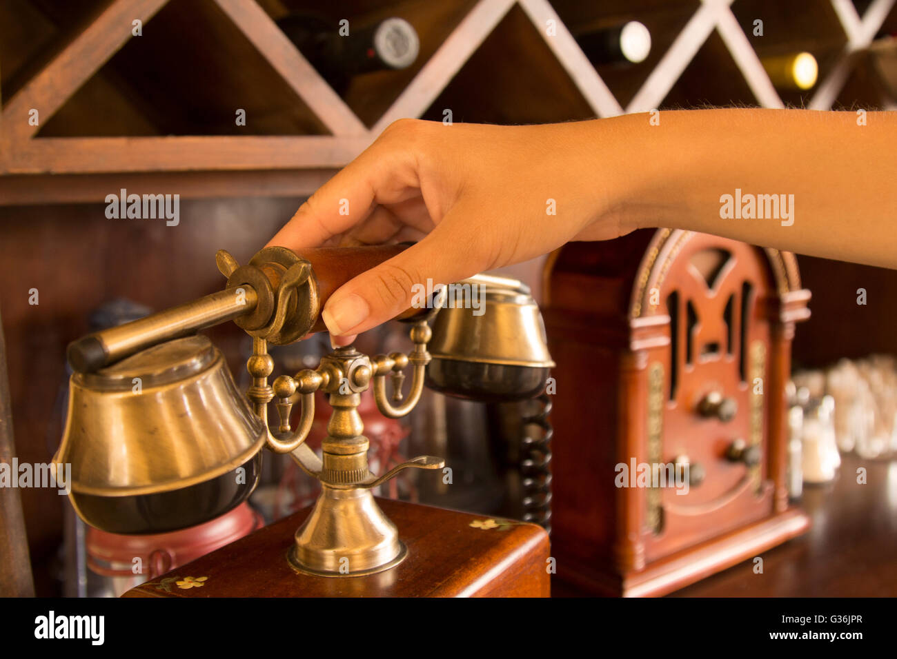 Hand holding up a vintage handset Stock Photo - Alamy