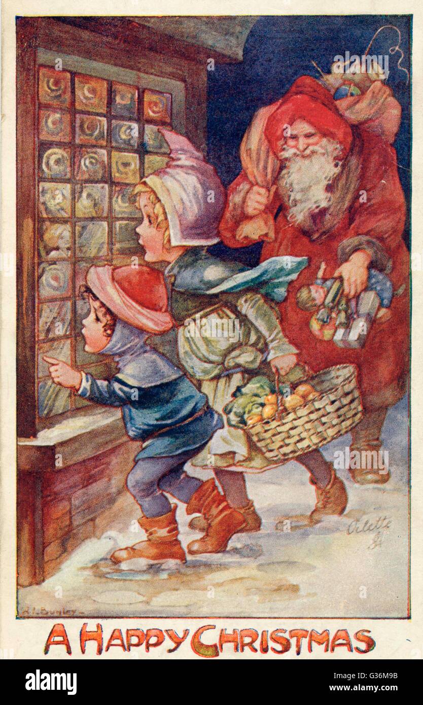 Father Christmas delivering Xmas presents Stock Photo - Alamy