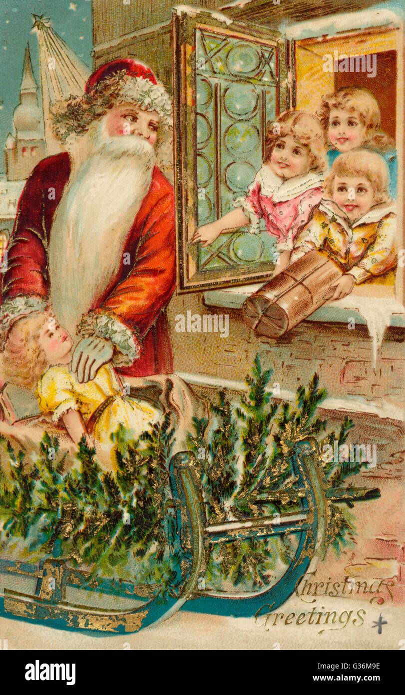 Father Christmas delivering Xmas presents Stock Photo - Alamy