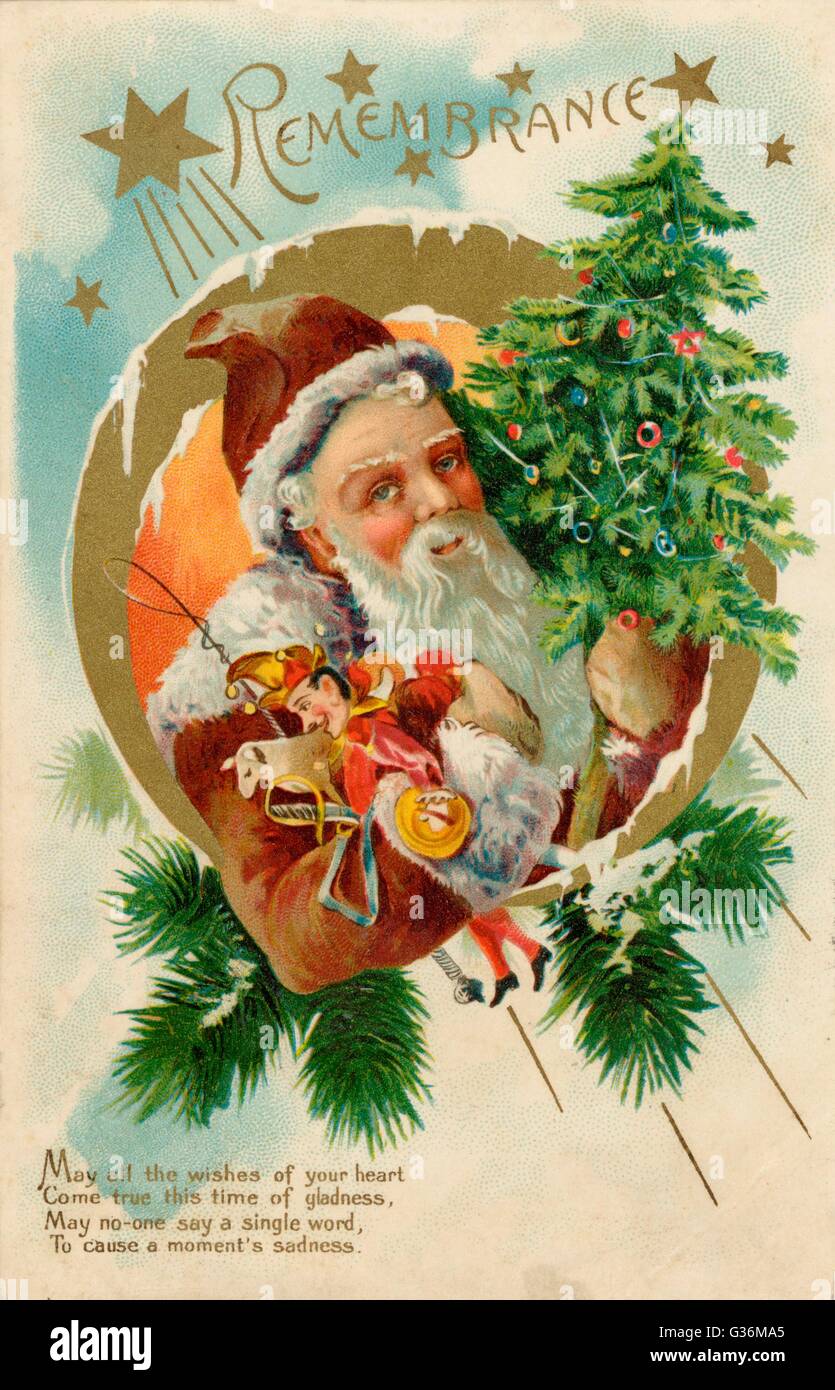 Father Christmas with a sack of toys Stock Photo - Alamy