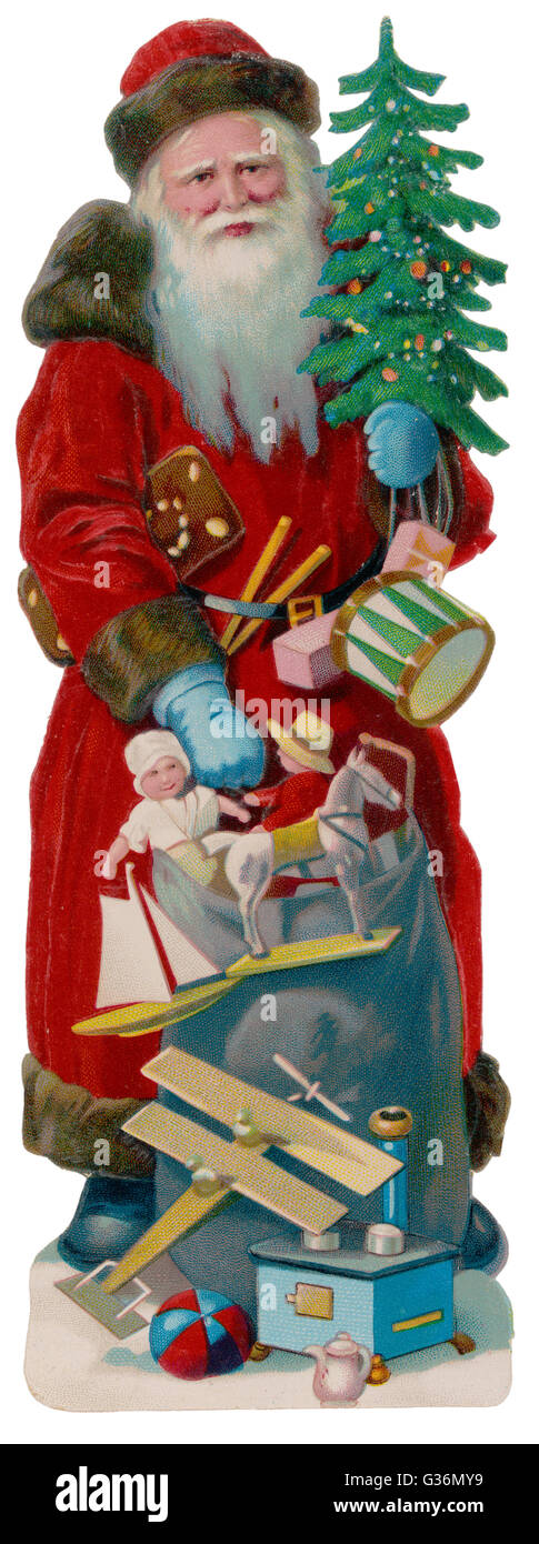 Father Christmas delivering Xmas presents Stock Photo - Alamy