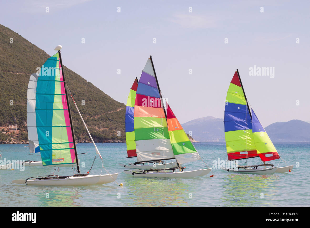 Sailboats with colorful sails Stock Photo - Alamy