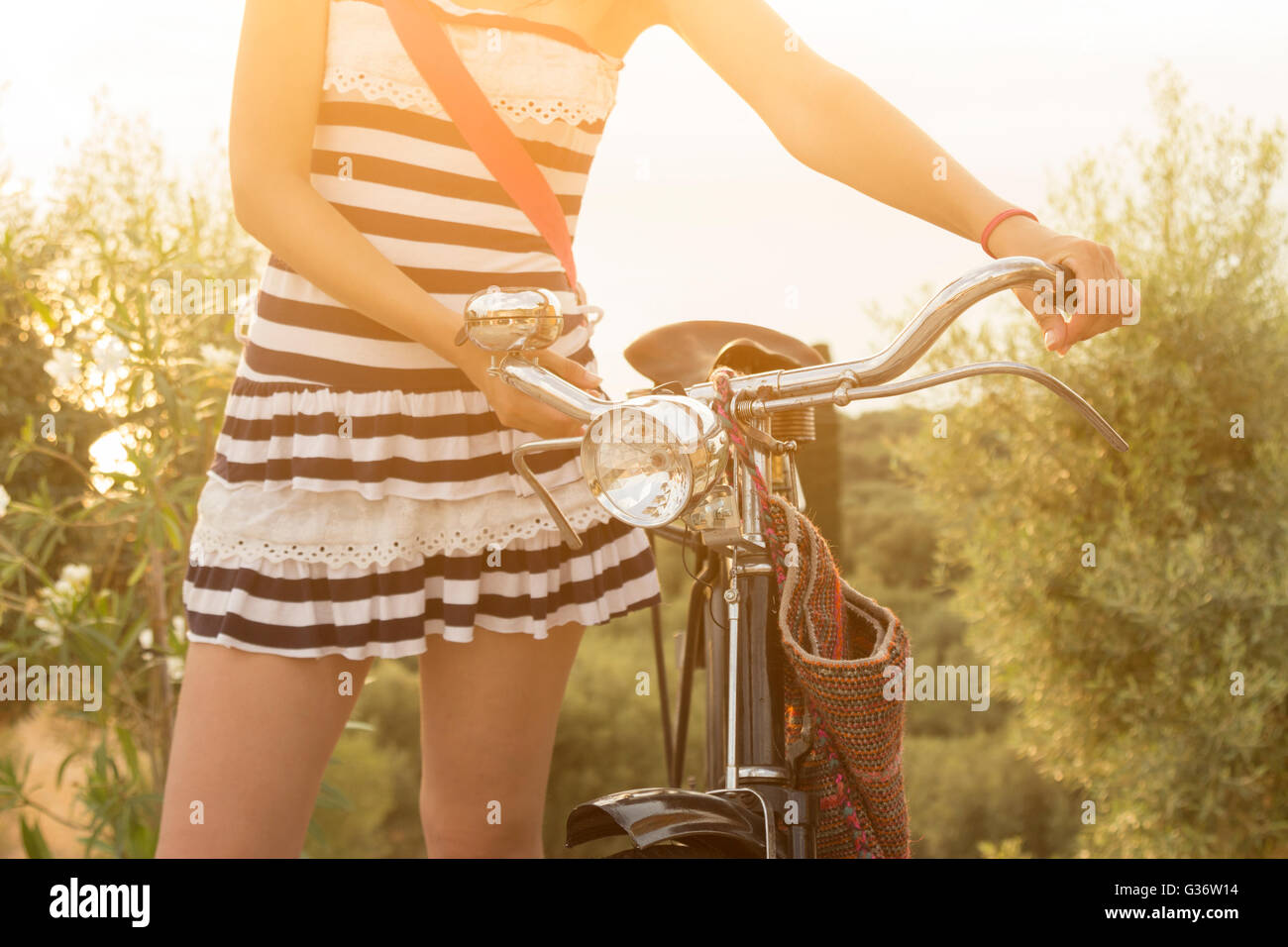 Hands holding handlebar bicycle hi-res stock photography and images - Alamy