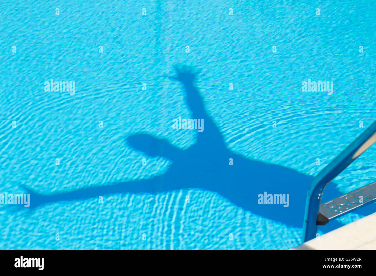 Human shadow in the swimming pool Stock Photo - Alamy